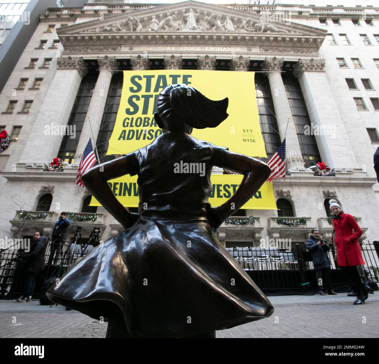The Fearless Girl statue is unveiled at its new location in front of ...