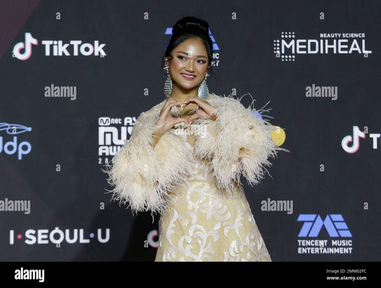 Indonesian singer Marion Jola poses as she arrives on the red carpet of ...