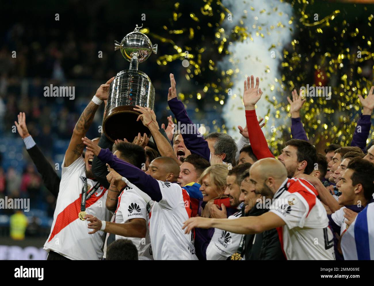 Argentina's River Plate players hold the trophy aloft as they celebrate ...