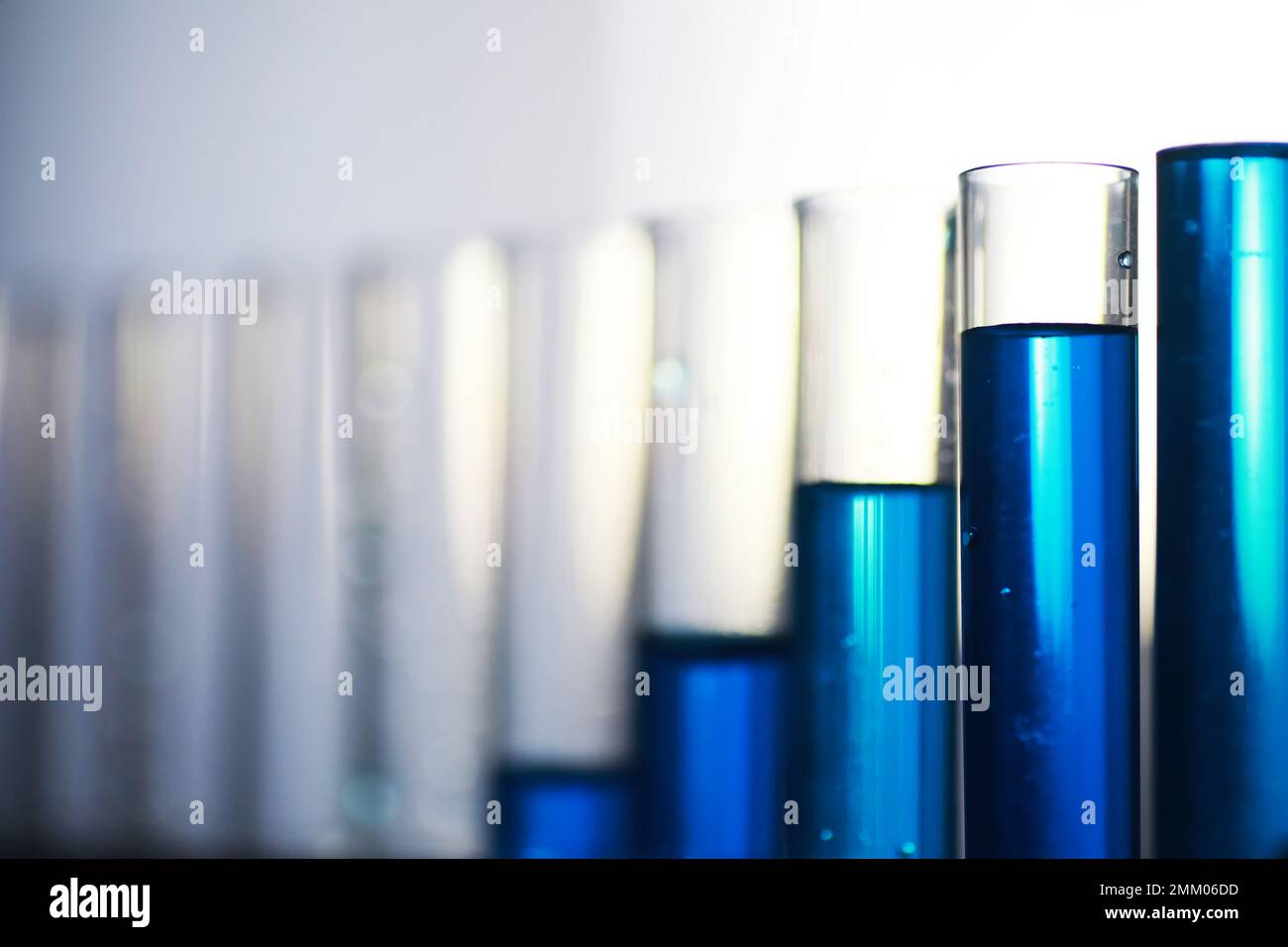 Test tube with blue liquid on laboratory table. Examination of liquid ...