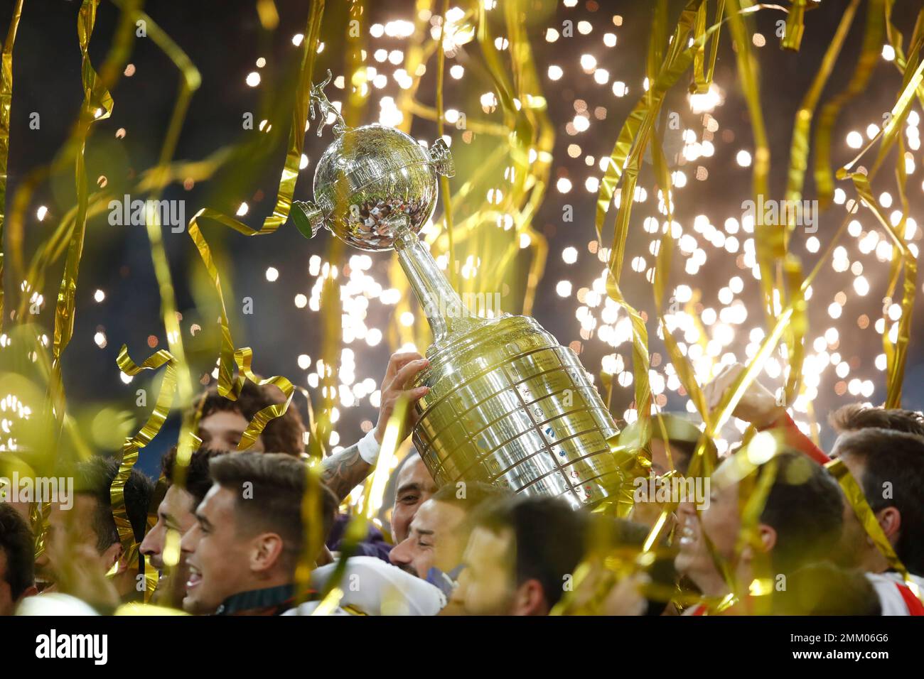 Argentina's River Plate players hold the trophy aloft as they celebrate ...