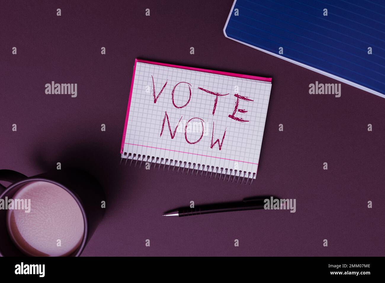 Conceptual caption Vote Now. Word Written on formal indication of choice between two or more ...