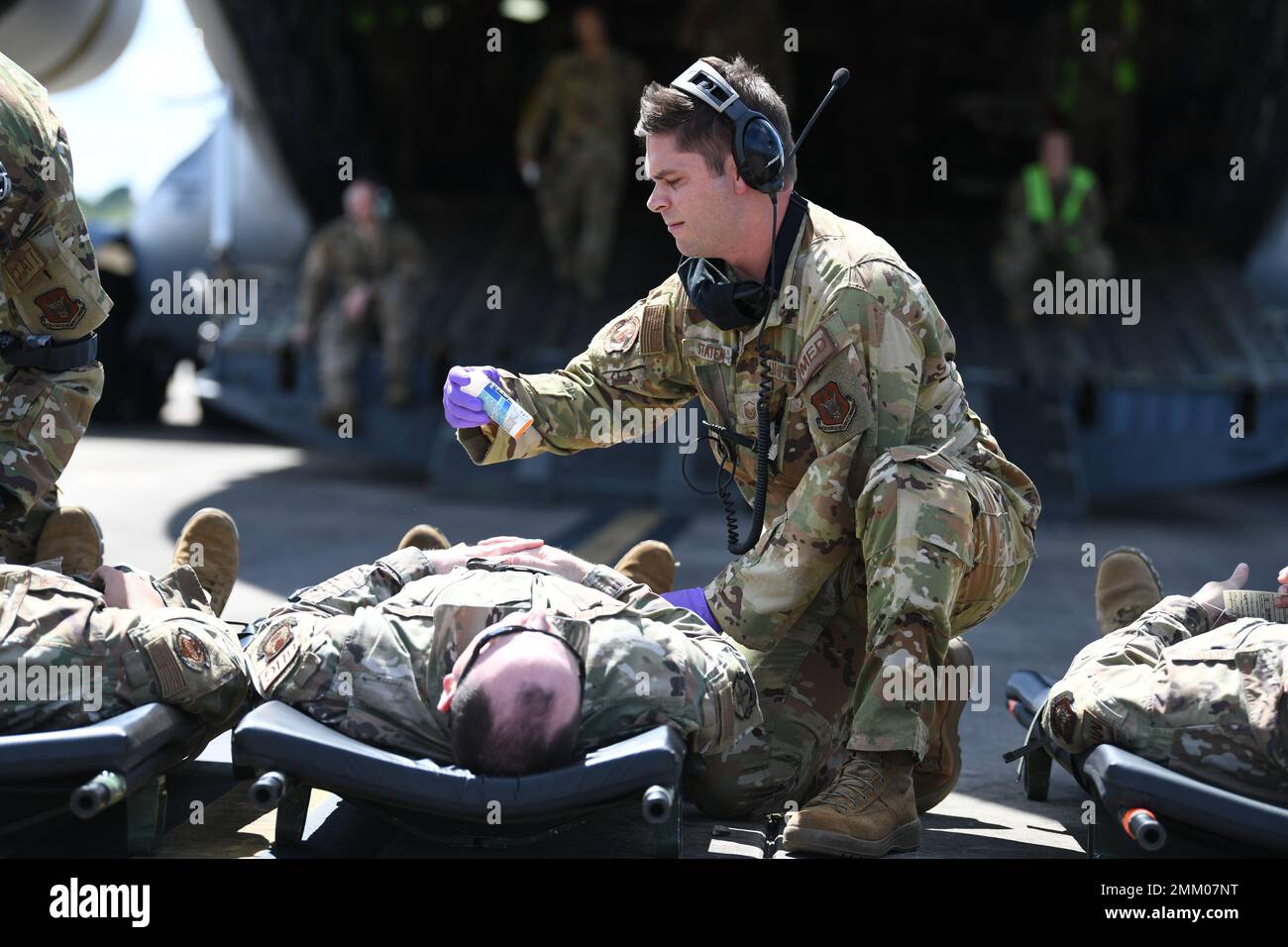 Senior Airman Joshua Johnson, Aeromedical Evacuation Squadron, checks ...