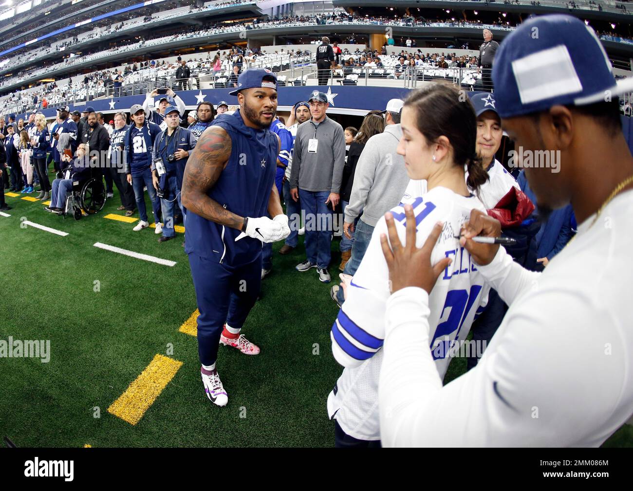 Dallas Cowboys' Justin March-Lillard talks with fans before an NFL ...