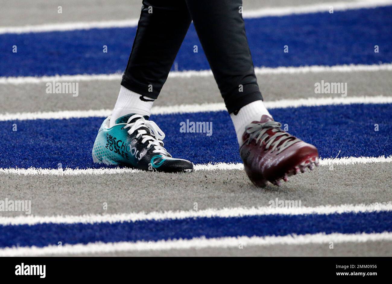 Dallas Cowboys wide receiver Allen Hurns wears special cleats before an ...