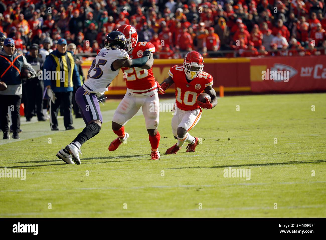 Kansas City Chiefs wide receiver Tyreek Hill (10) carries the ball as ...