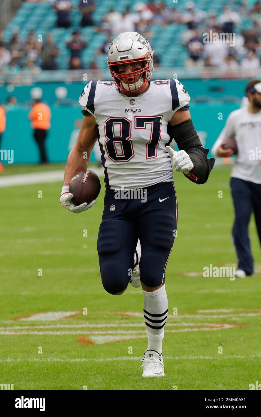 New England Patriots tight end Rob Gronkowski (87) warms up, before an ...