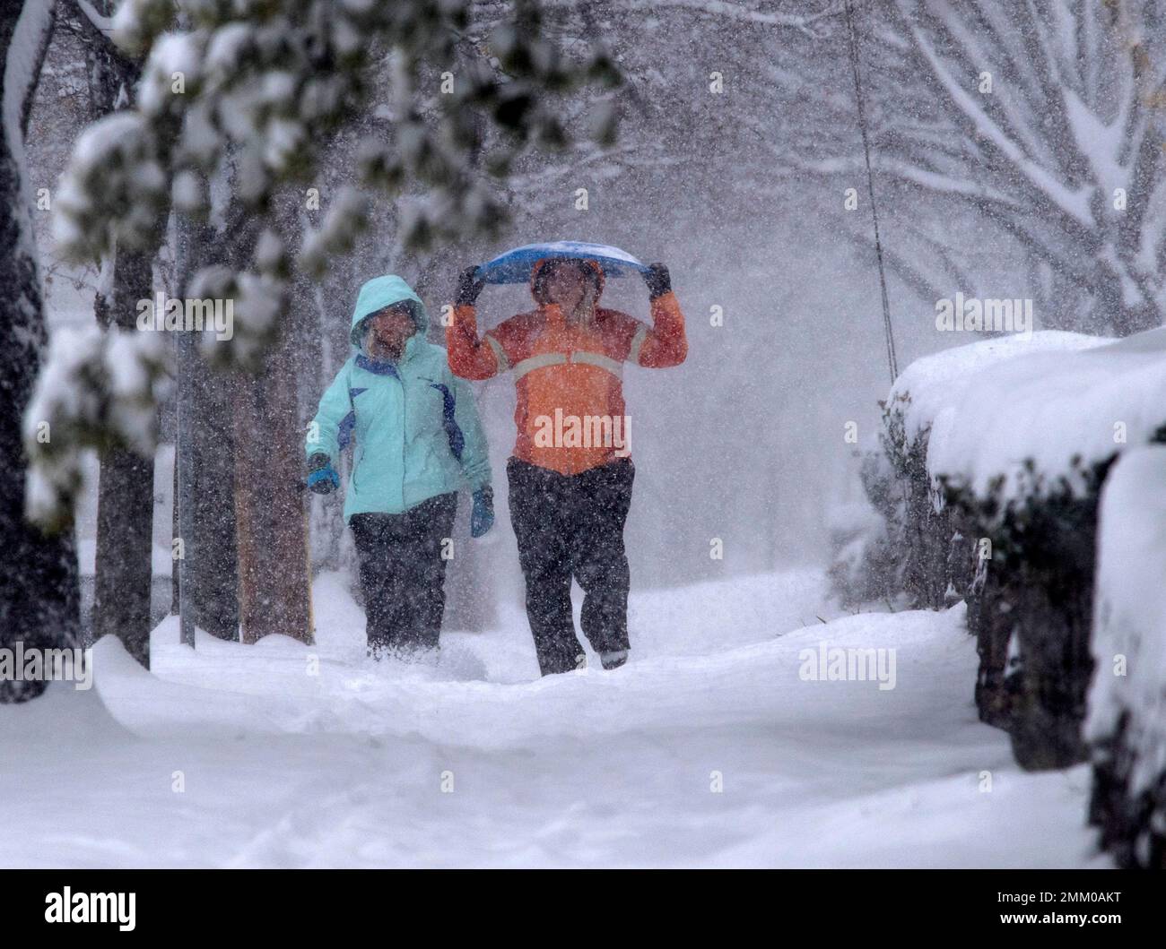 Friends Crystal Dudley, left, and Maggie Pope head to a local park in ...