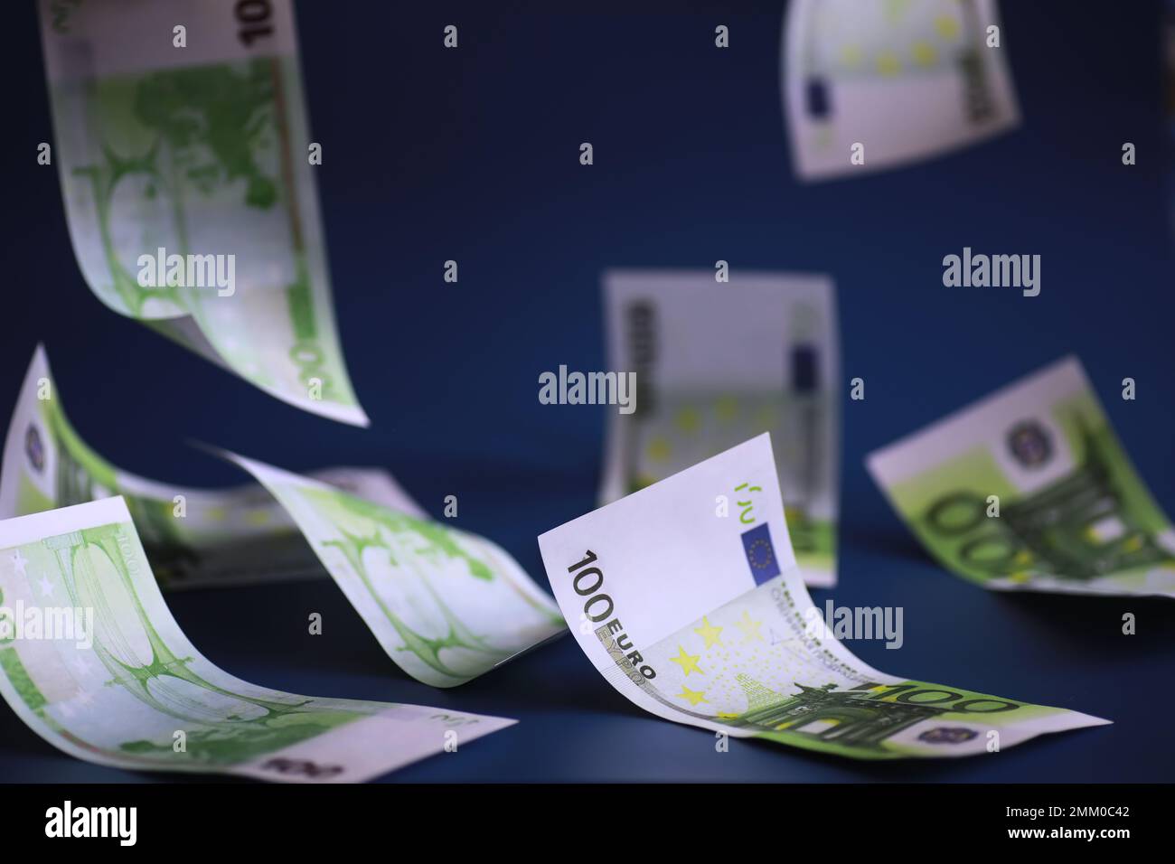 Euro banknotes are falling. The concept financial well-being and ...