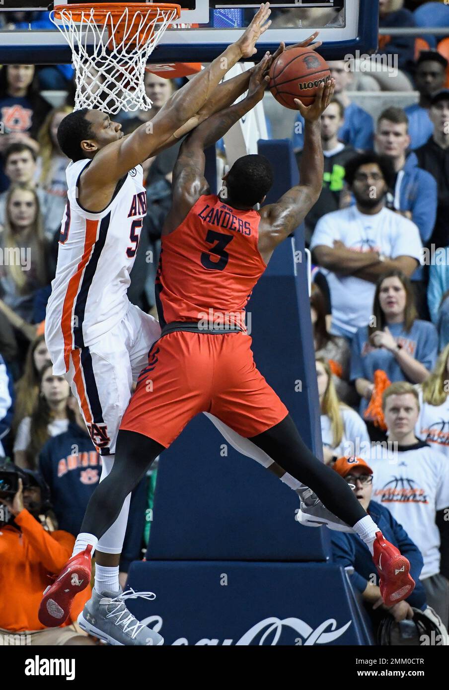 Auburn center Austin Wiley (50) blocks a shot by Dayton guard Trey ...
