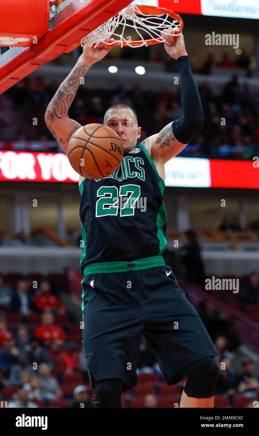 Boston Celtics forward Daniel Theis dunks the ball against the Chicago ...