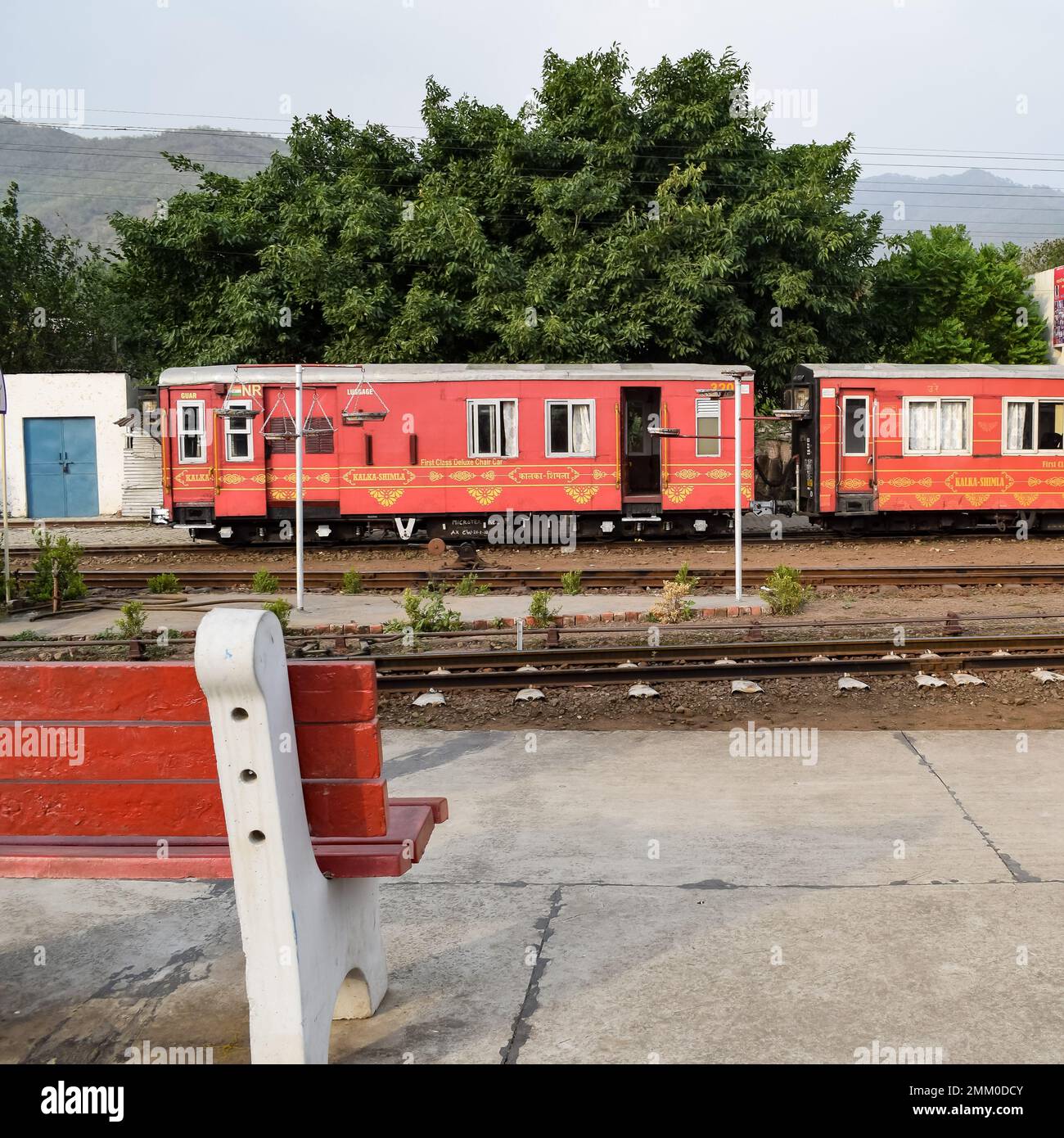 View of Toy train coach from the middle of railway track during daytime ...