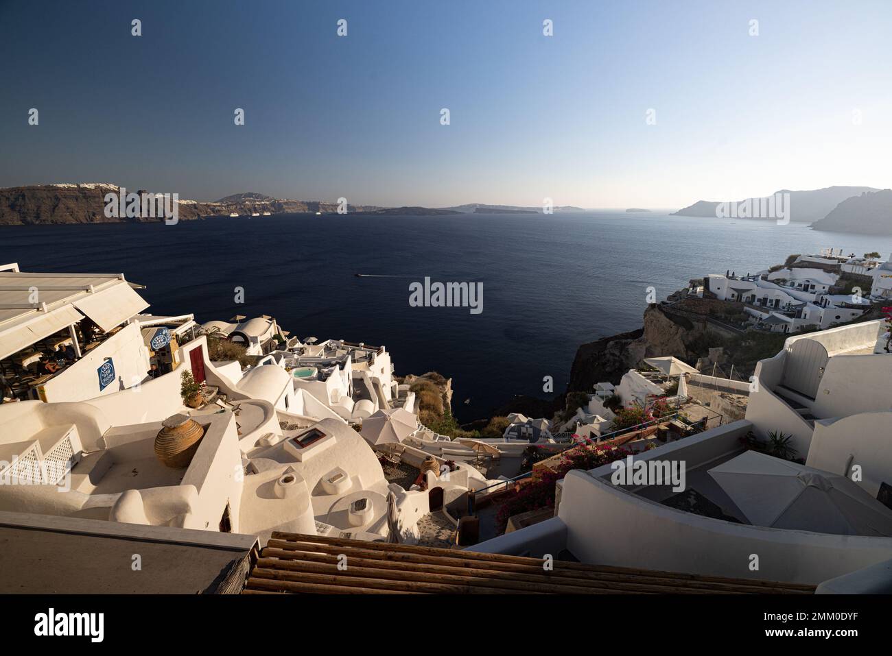 whitewashed buildings The town of Oia, Santorini, Greece Stock Photo ...