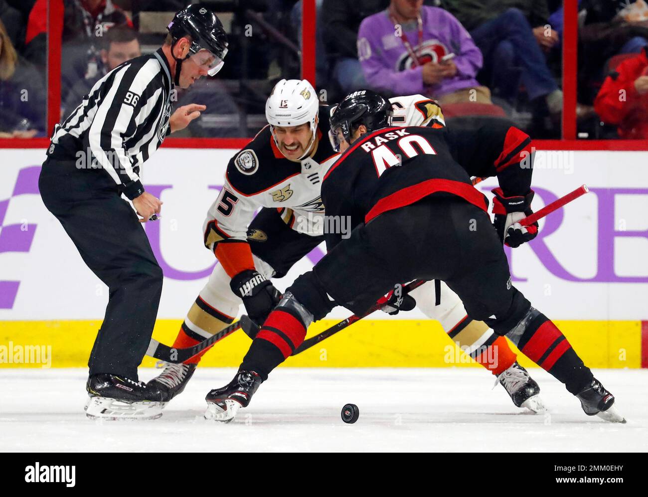 Anaheim Ducks' Ryan Getzlaf (15) faces off against Victor Rask (49 ...