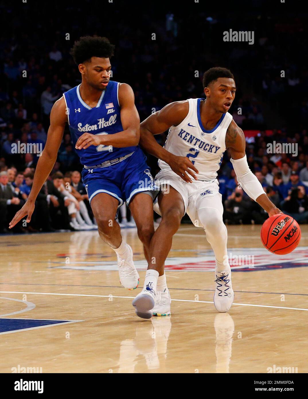 Seton Hall guard Anthony Nelson (2) defends against Kentucky guard ...