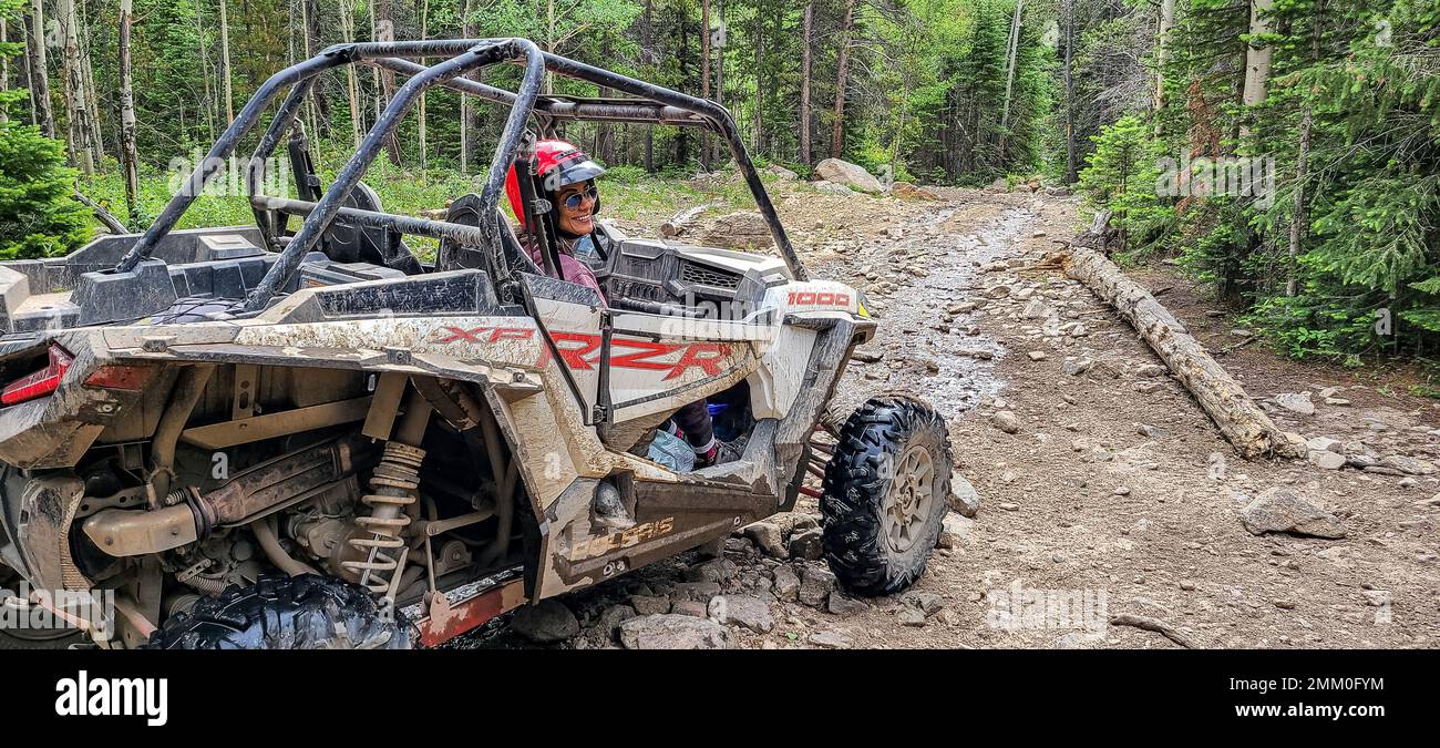 Woman touring on an ATV Rocky Mountain National Park is an American ...