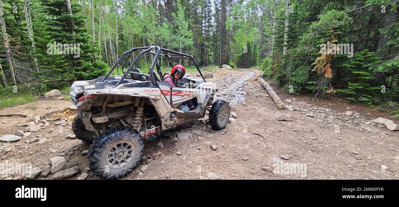 Woman touring on an ATV Rocky Mountain National Park is an American ...