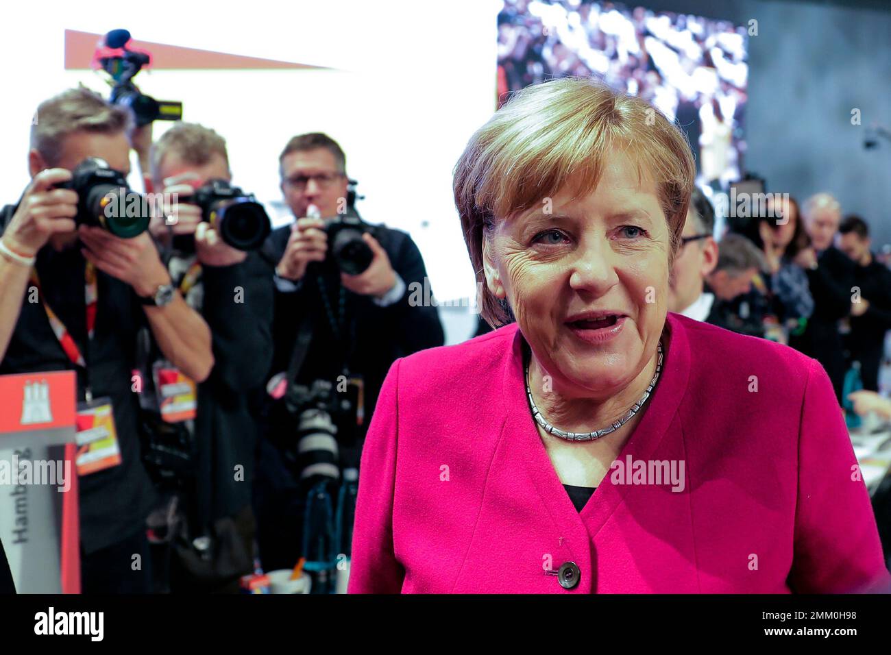 German Chancellor Angela Merkel arrives at a party convention of the ...