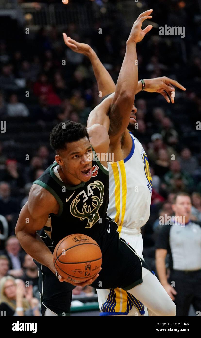 Milwaukee Bucks' Giannis Antetokounmpo and Golden State Warriors' Andre ...