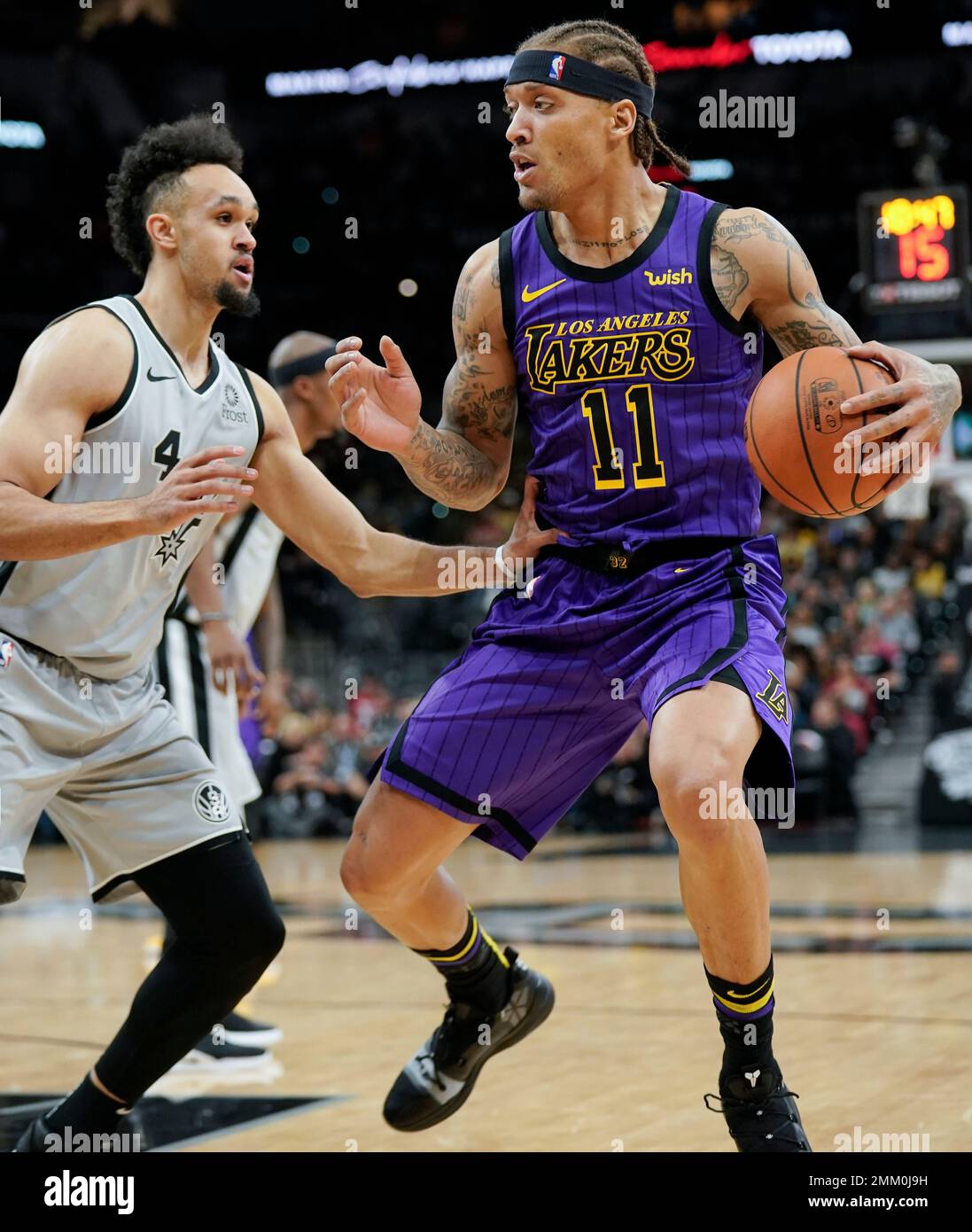 Los Angeles Lakers' Michael Beasley (11) drives against San Antonio ...