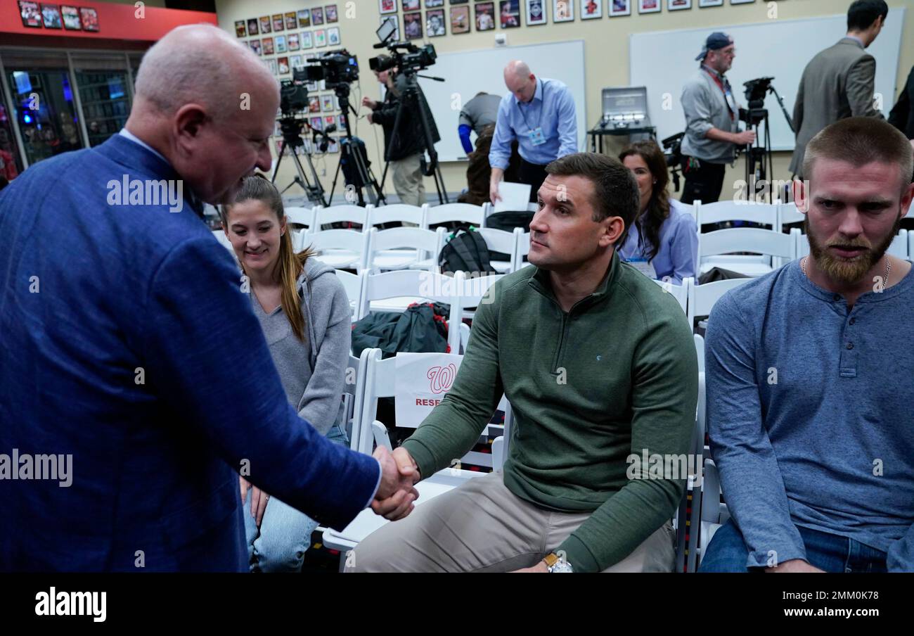 Washington Nationals owner Mark Lerner, left, greet players Ryan ...