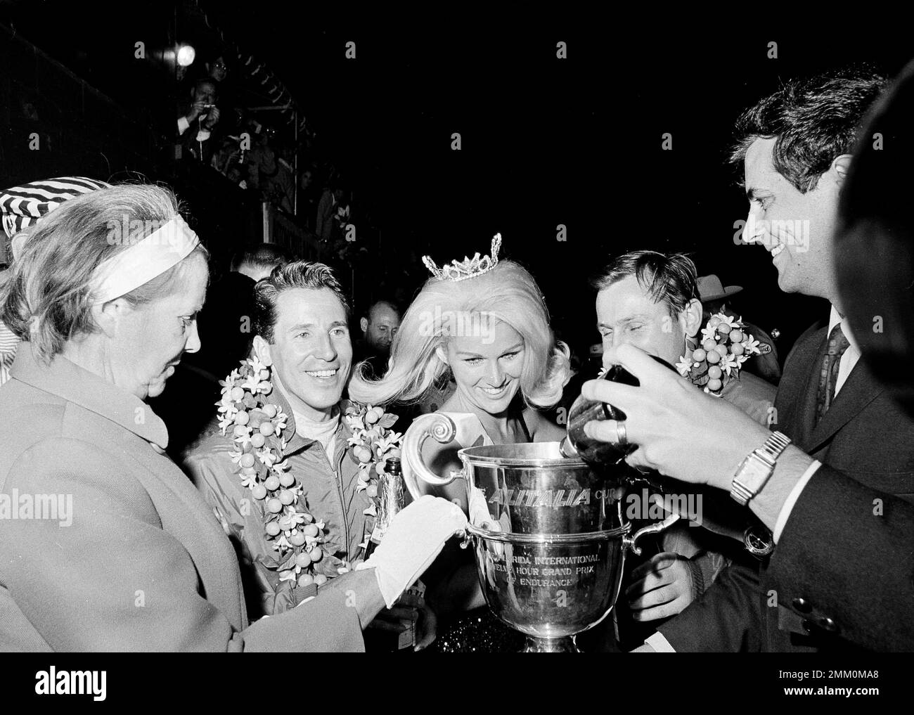 The winning drivers in the Sebring 12-hour endurance race, Mario ...