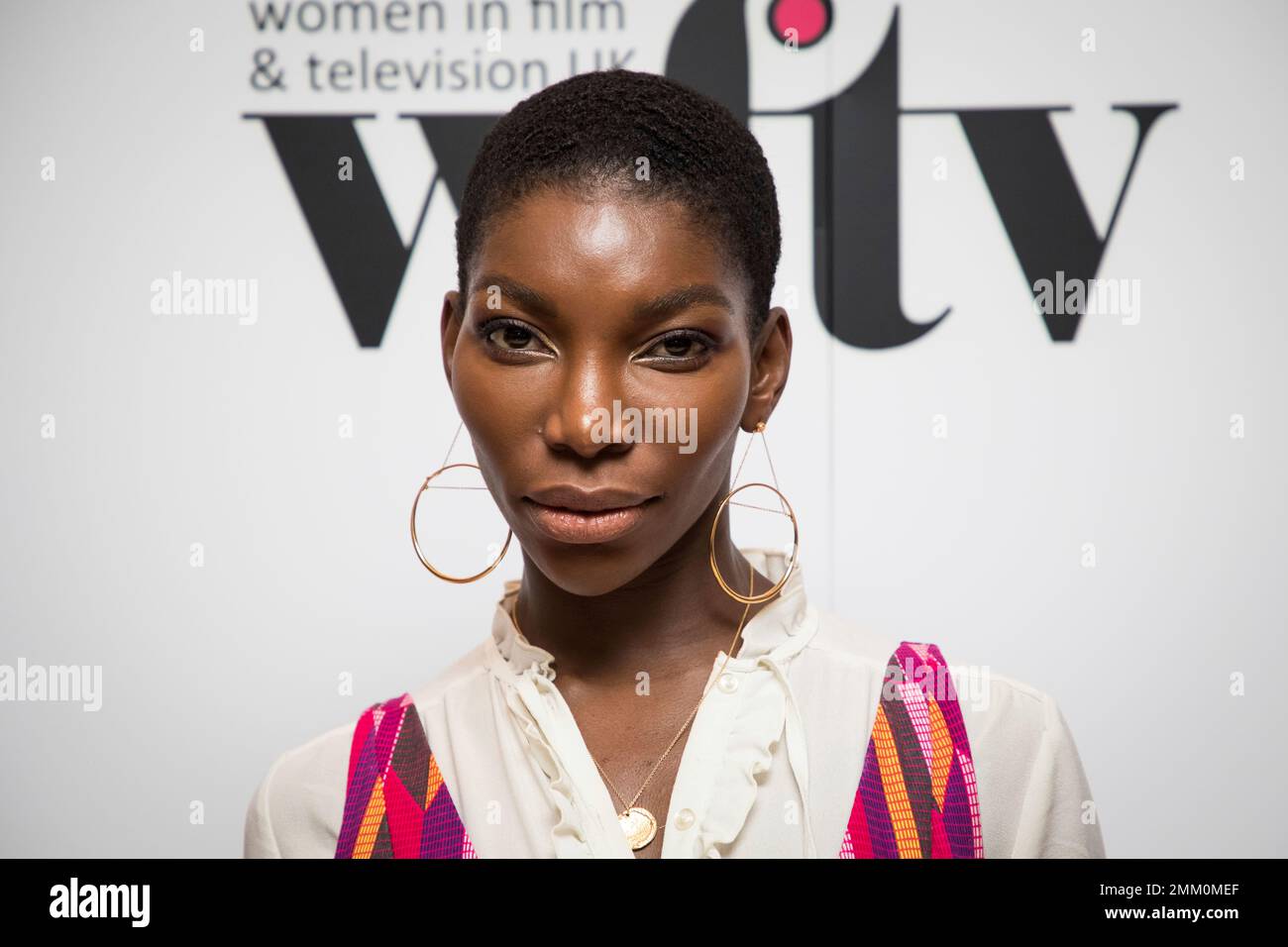 Actress Michaela Coel poses for photographers upon arrival at the Women ...