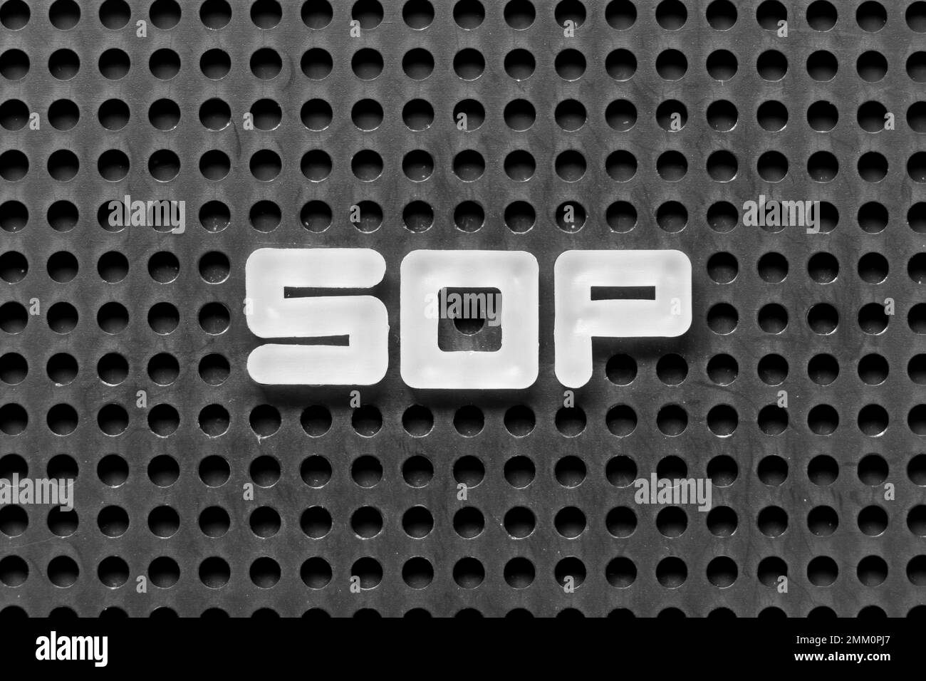 White alphabet letter in word SOP (Abbreviation Standard Operating ...