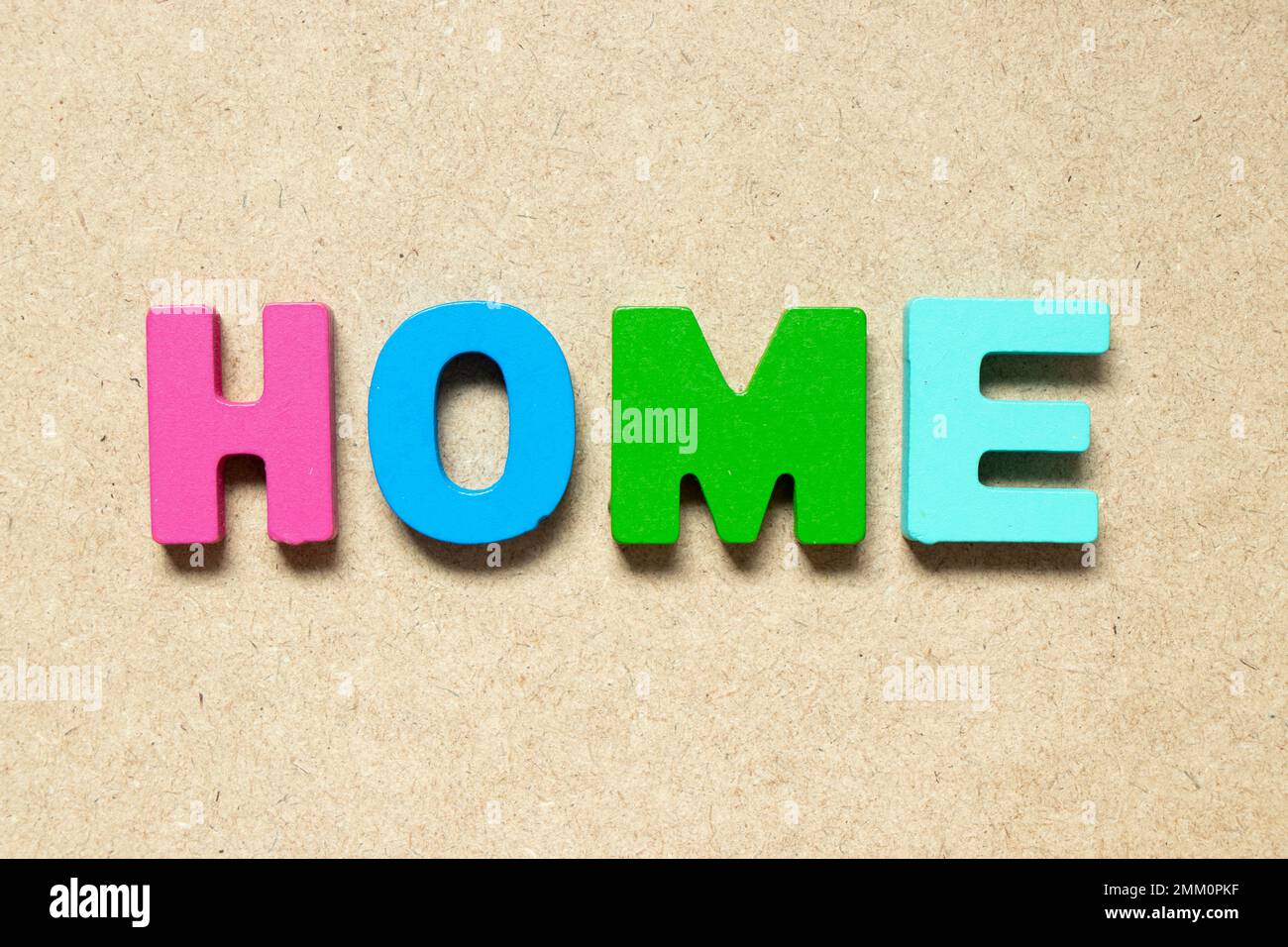 Color alphabet letter in word home on wood background Stock Photo - Alamy