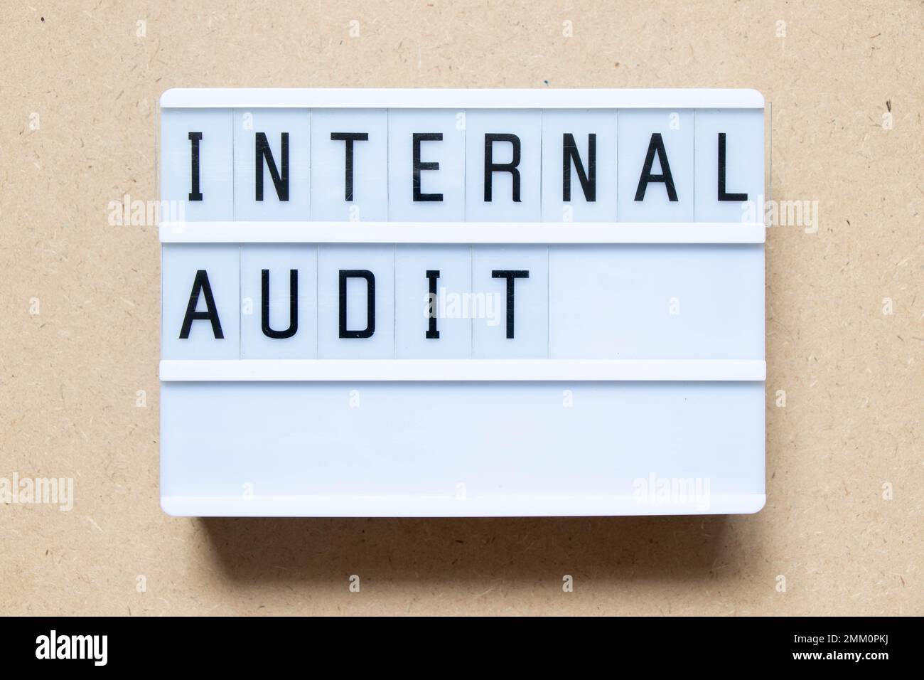 Lightbox with word internal audit on wood background Stock Photo - Alamy