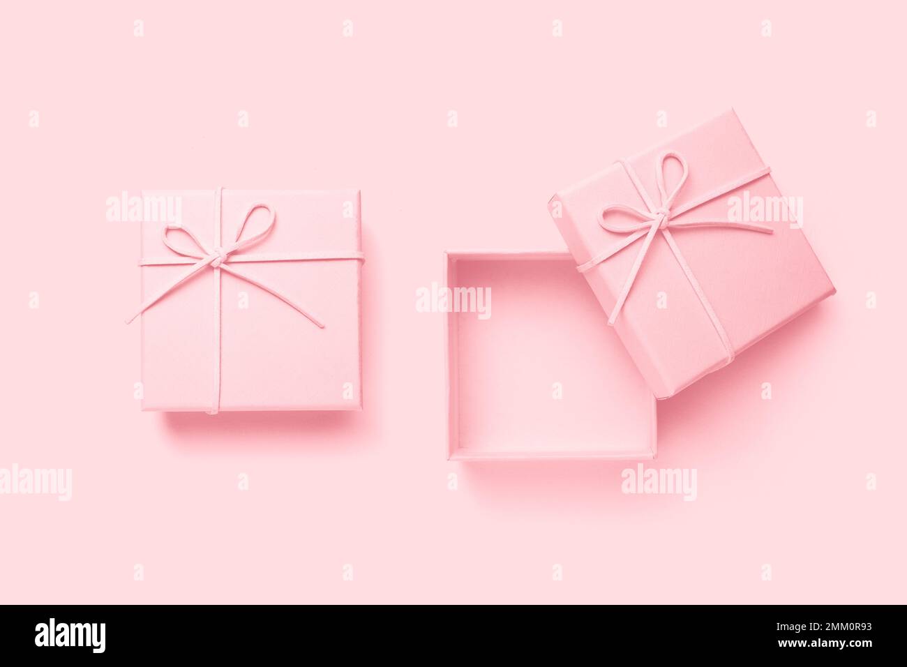 Top view of empty open gift box for congratulations on pink background ...