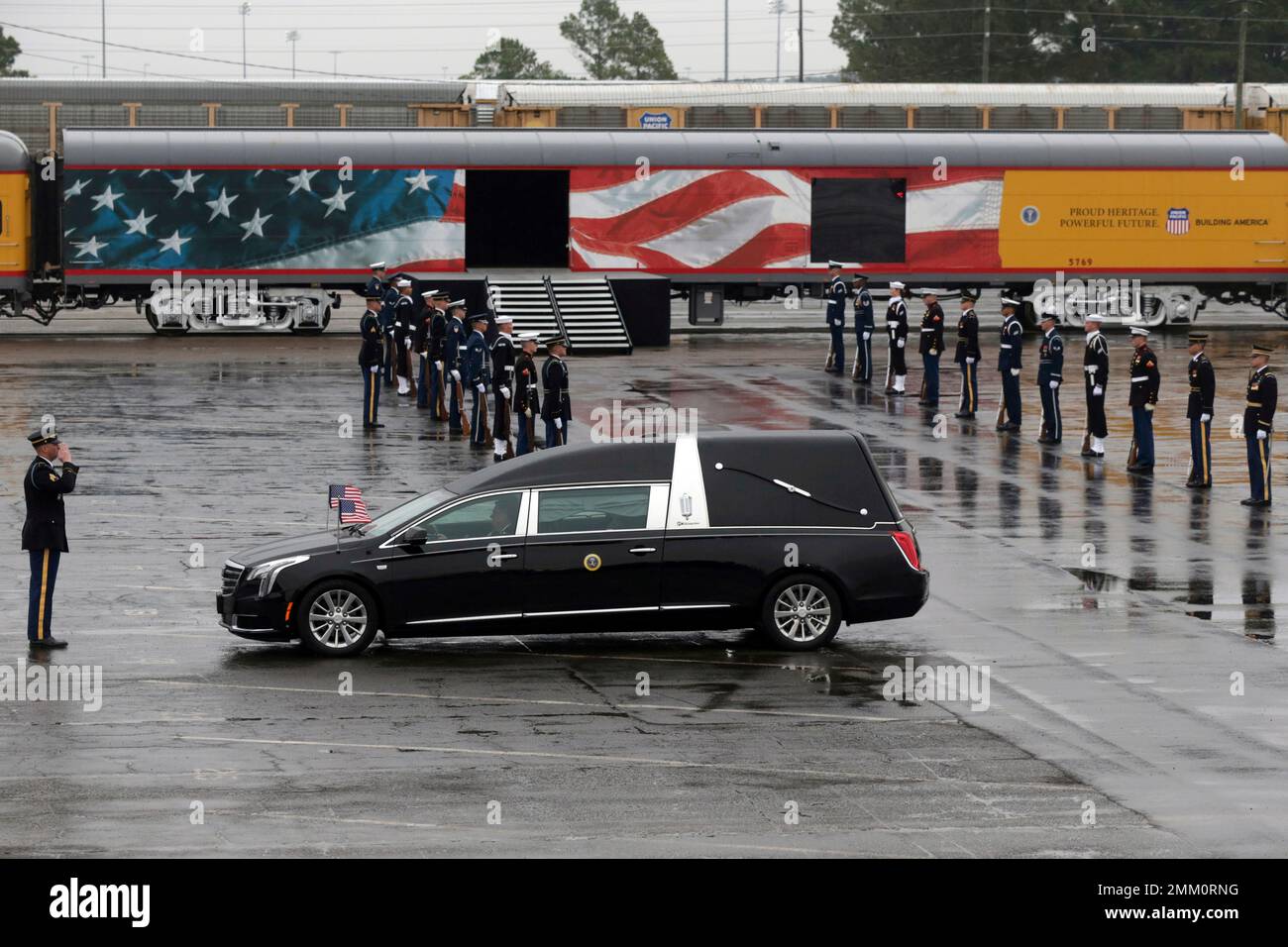 The hearse carrying the flag-draped casket of former President George H ...