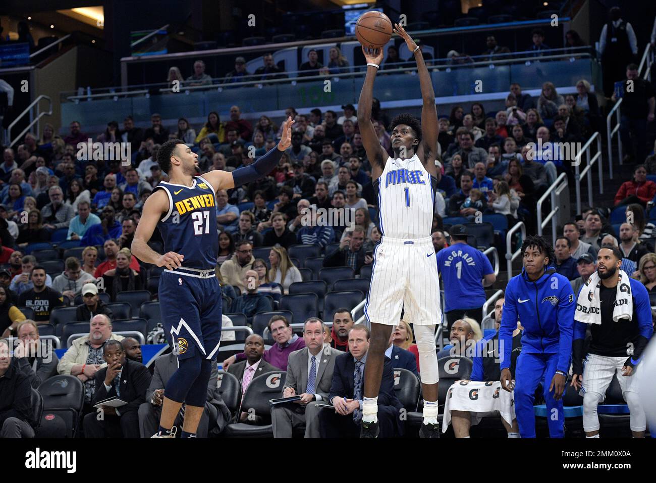Orlando Magic forward Jonathan Isaac (1) goes up for a shot in front of ...
