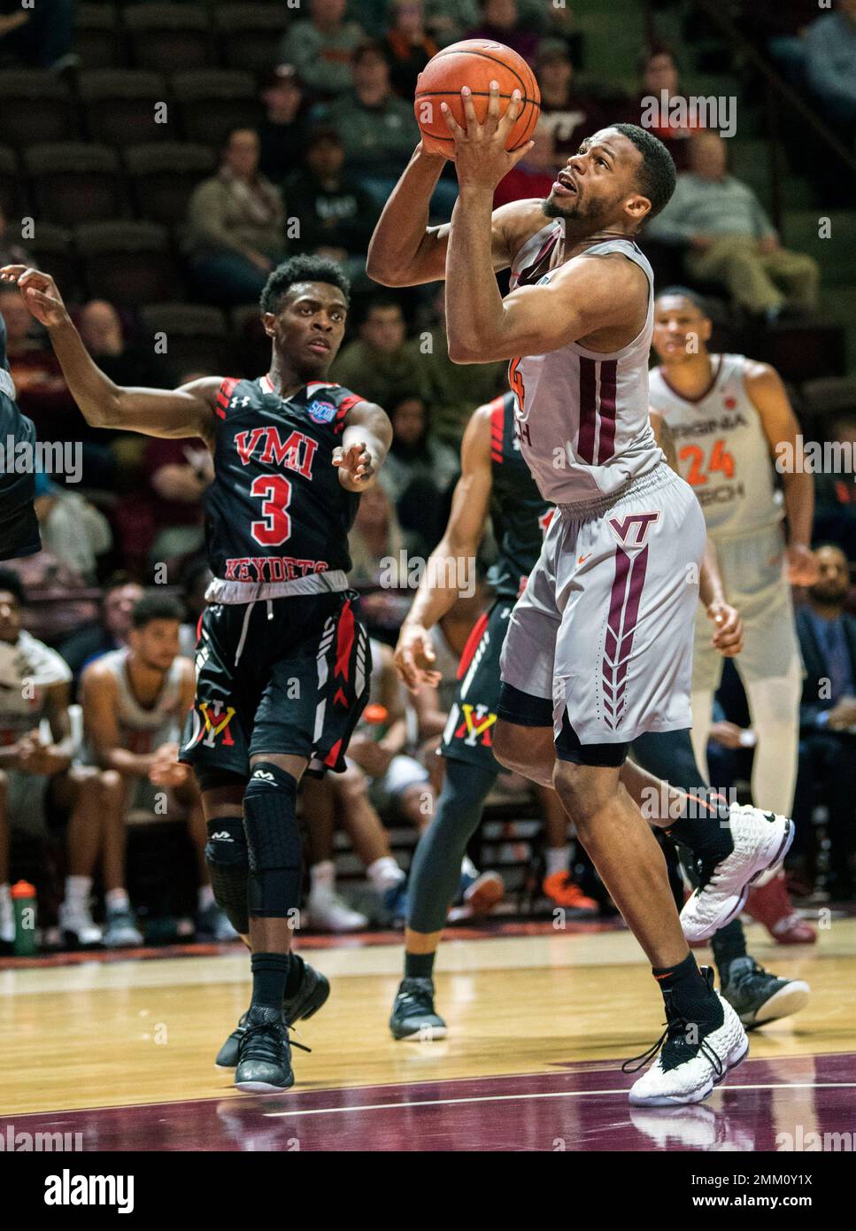 Virginia Tech forward P.J. Horne (14) shoots the ball against Virginia ...