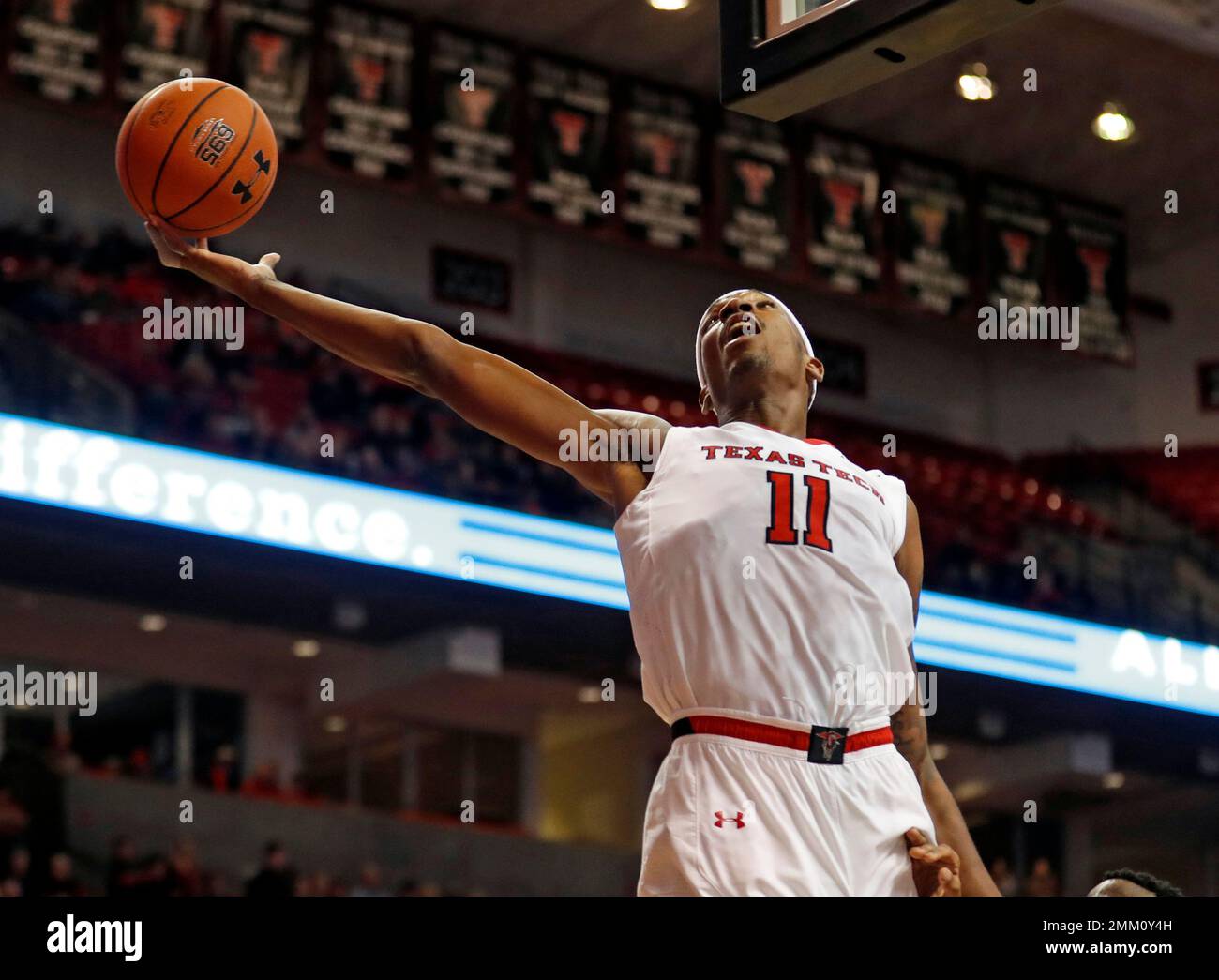 Texas Tech's Tariq Owens (11) tries to rebound the ball during the ...