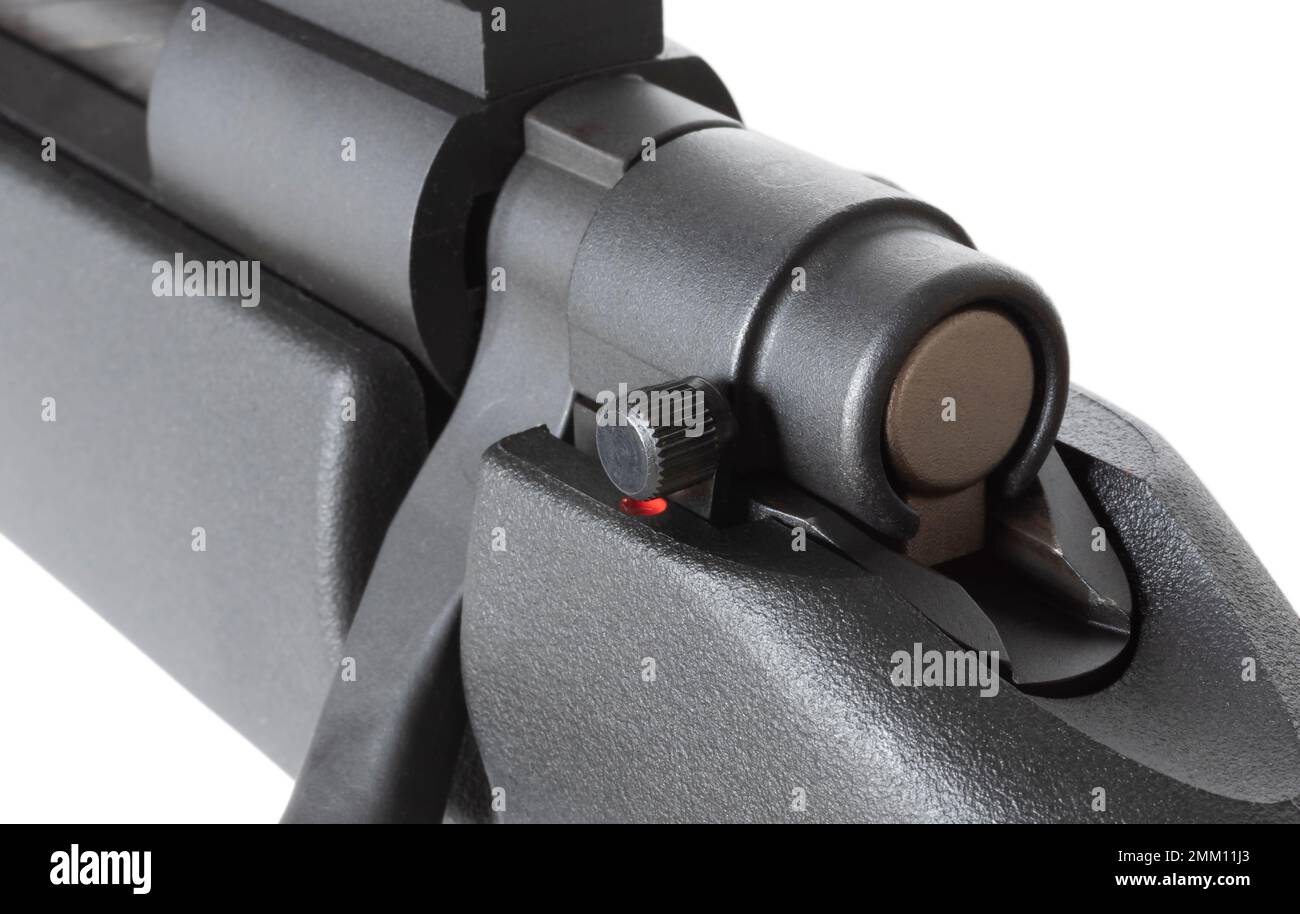Safety on a bolt action rifle that is engaged on a white background ...