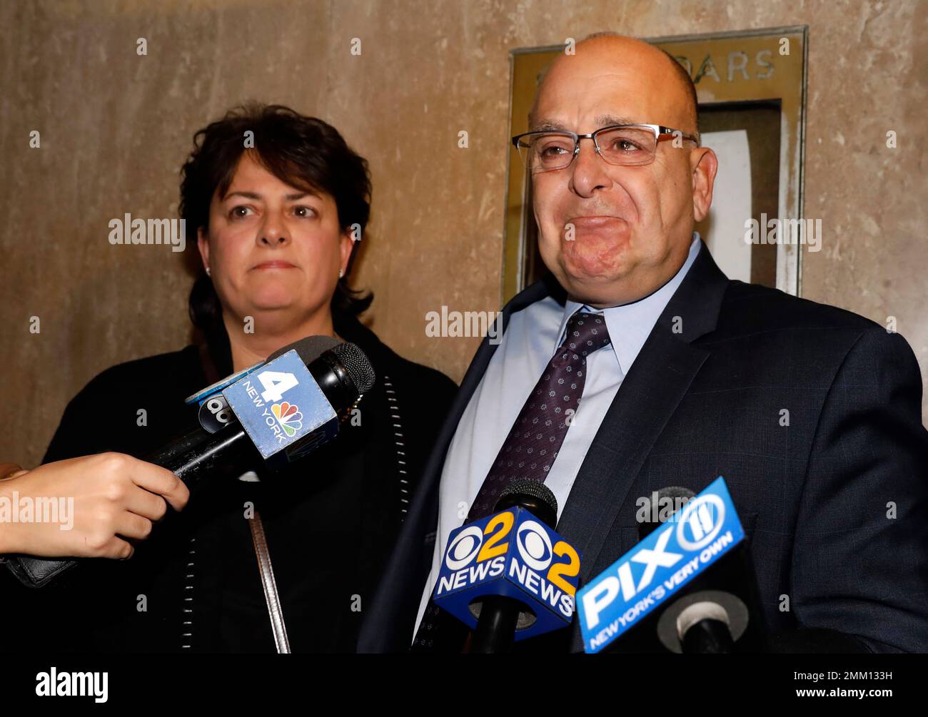 Pat Comunale and Lisa Comunale, parents of Joseph Comunale, react while ...