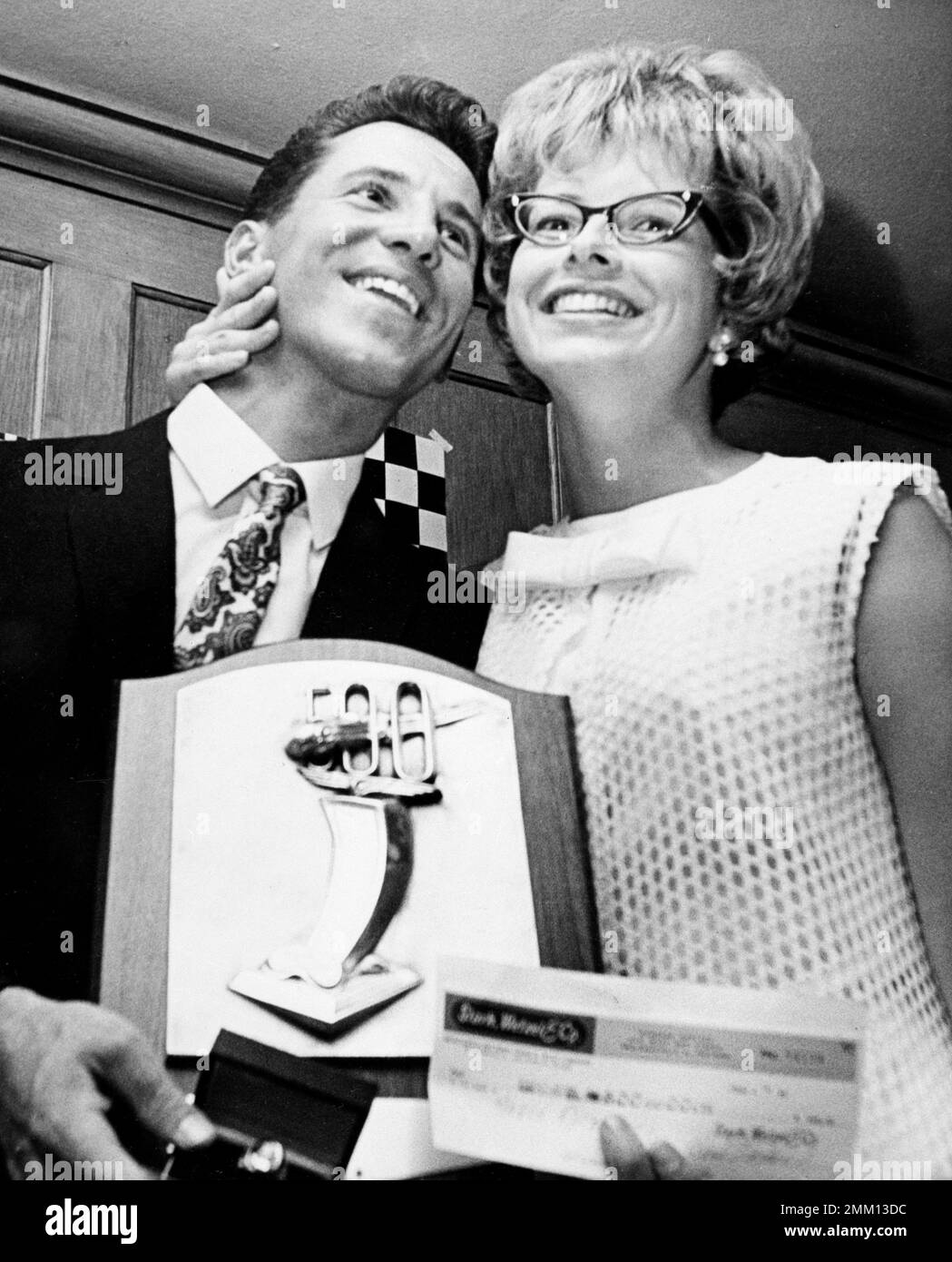 Race driver Mario Andretti of Nazareth, Penn., rated a hug from his ...