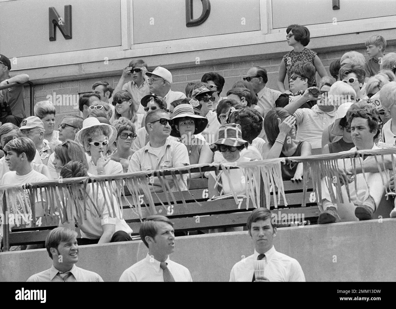 Dee Ann Andretti, Mario Andretti's wife, looks toward the track and has ...