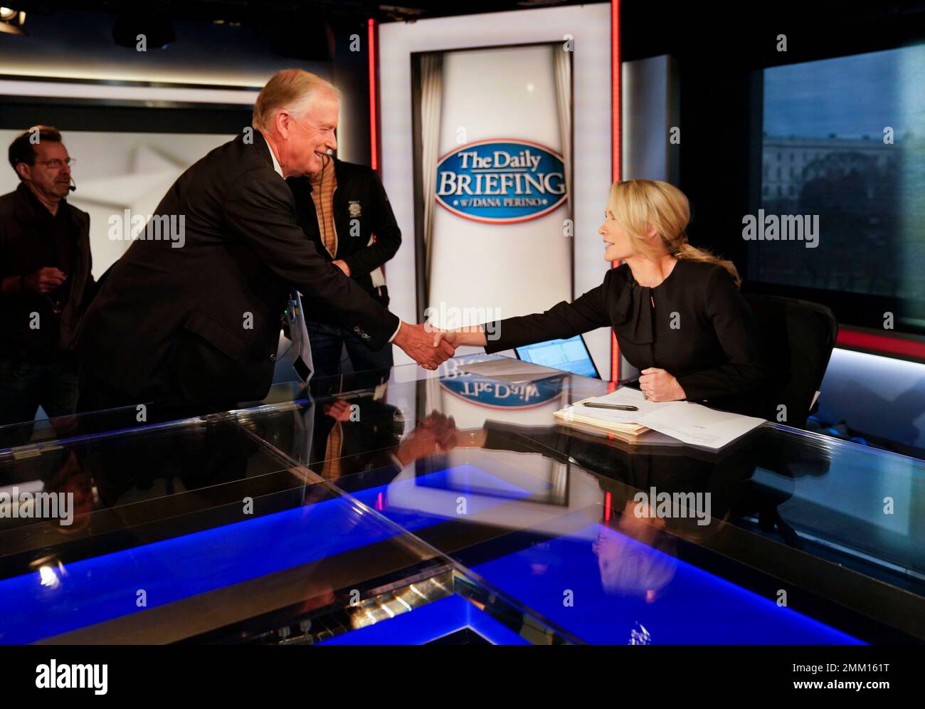 Fox News anchor of the Daily Briefing, Dana Perino, right, shakes hands ...