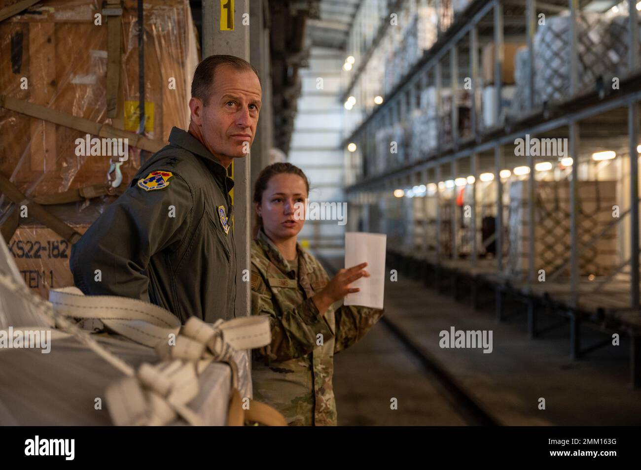 From the left, Maj. Gen. Corey Martin, 18th Air Force commander ...