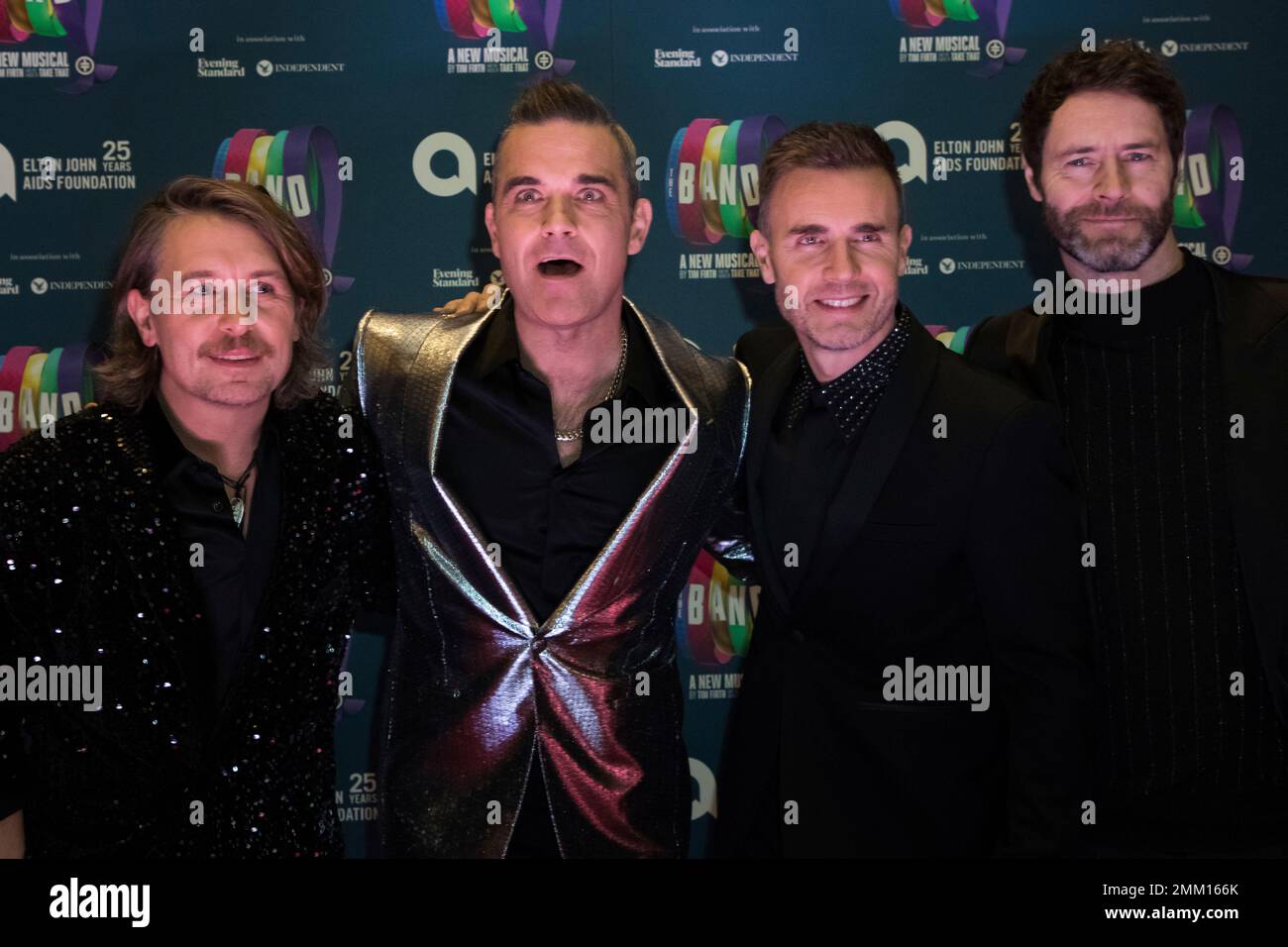 Take That band members, from left, Mark Owen, Robbie Williams, Gary ...