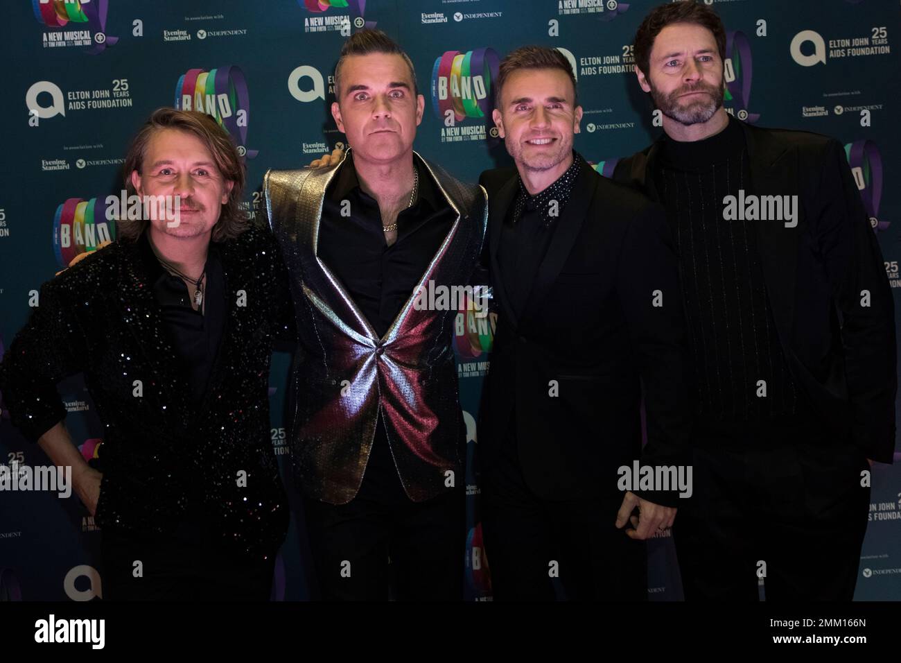 Take That band members, from left, Mark Owen, Robbie Williams, Gary ...