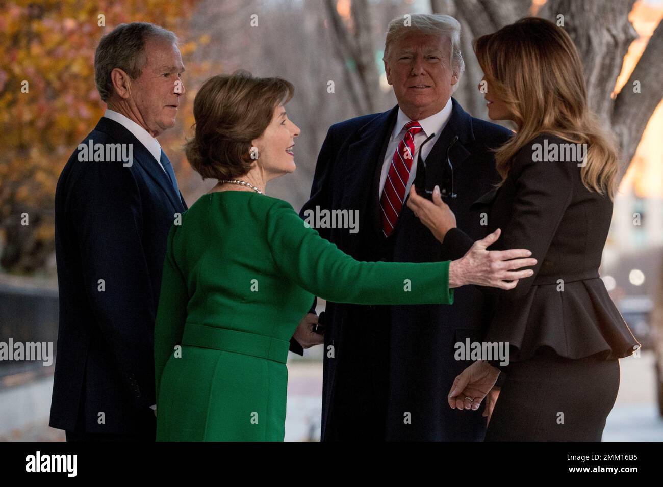 President Donald Trump, second from right, and first lady Melania Trump ...