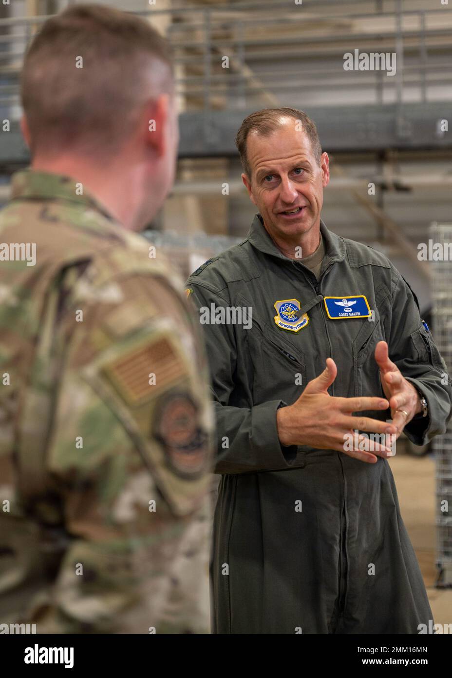 Maj. Gen. Corey Martin, 18th Air Force commander, speaks with Maj ...