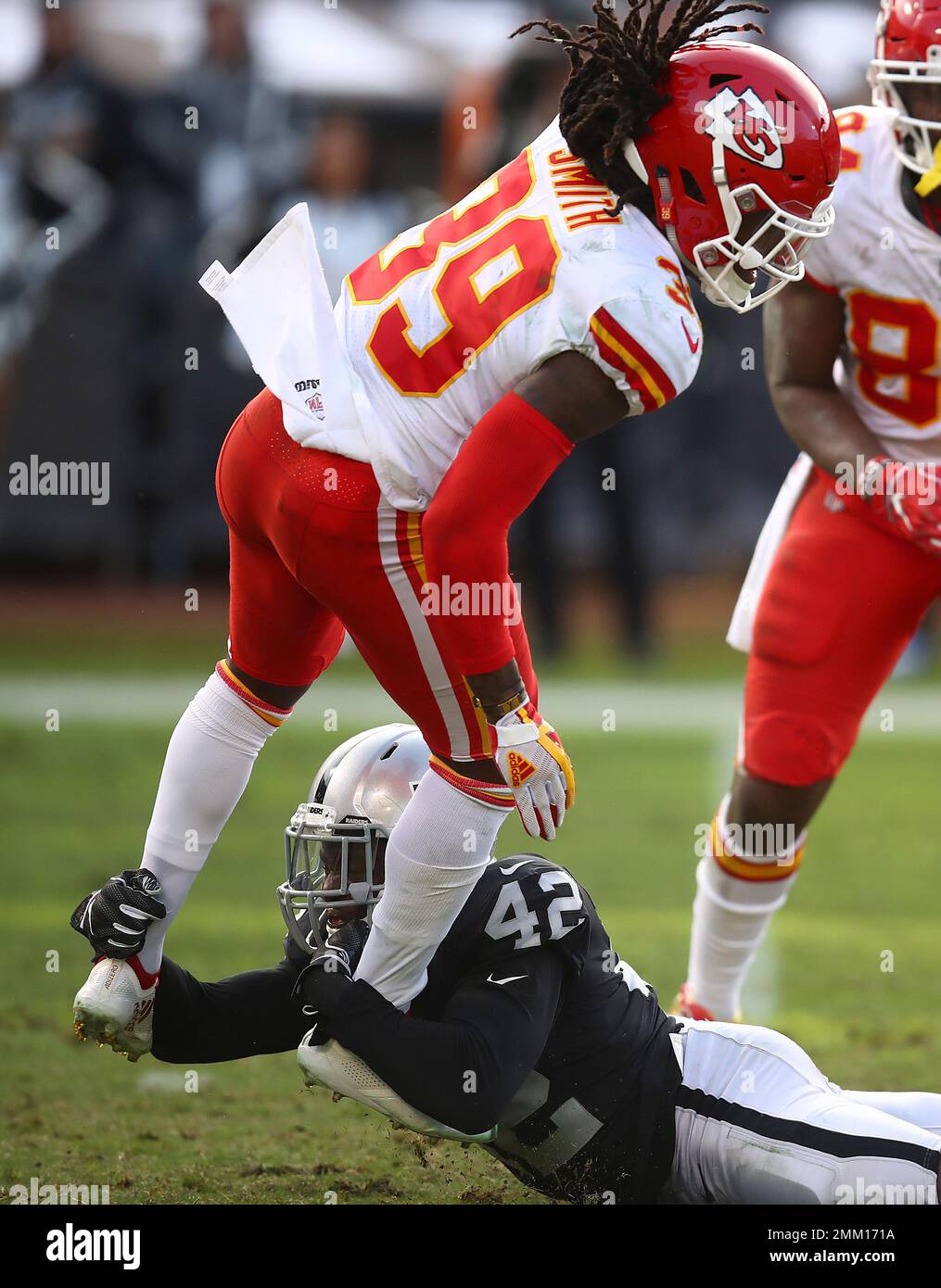 Oakland Raiders safety Karl Joseph (42) tackles Kansas City Chiefs ...