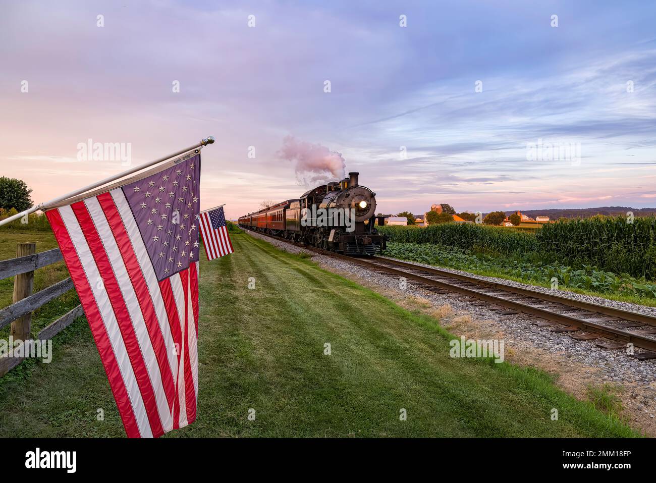 A View of a Classic Steam Passenger Train Approaching, With American ...
