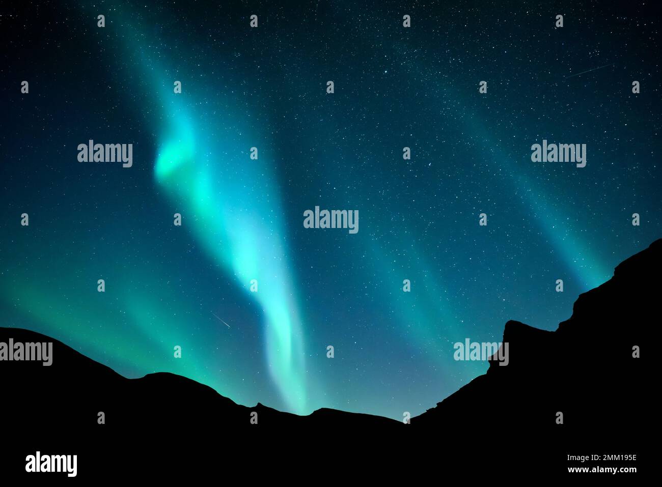 Aurora borealis. Northern lights in winter mountains. Sky with polar ...