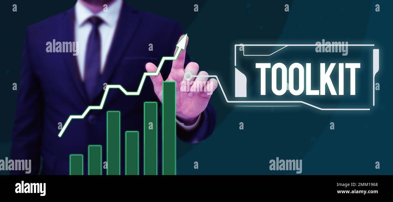Hand writing sign Toolkit. Word Written on set of tools kept in a bag ...
