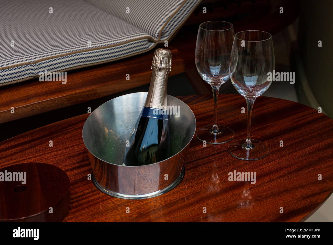 Italian spumante Franciacorta in ice bucket on Walnut table Stock Photo ...